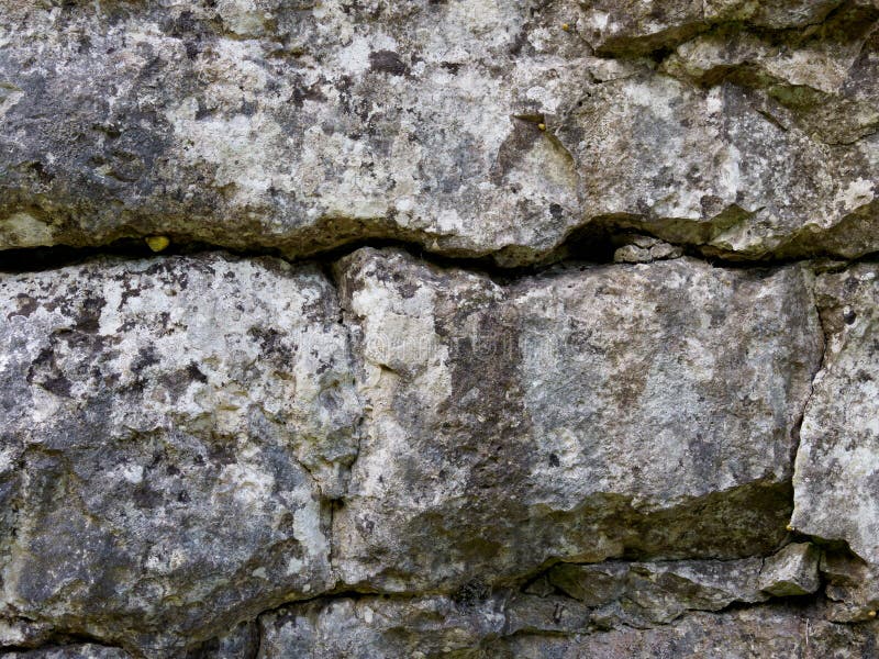 Close-up of Weathered Stone Blocks Showcasing Rugged Texture and ...