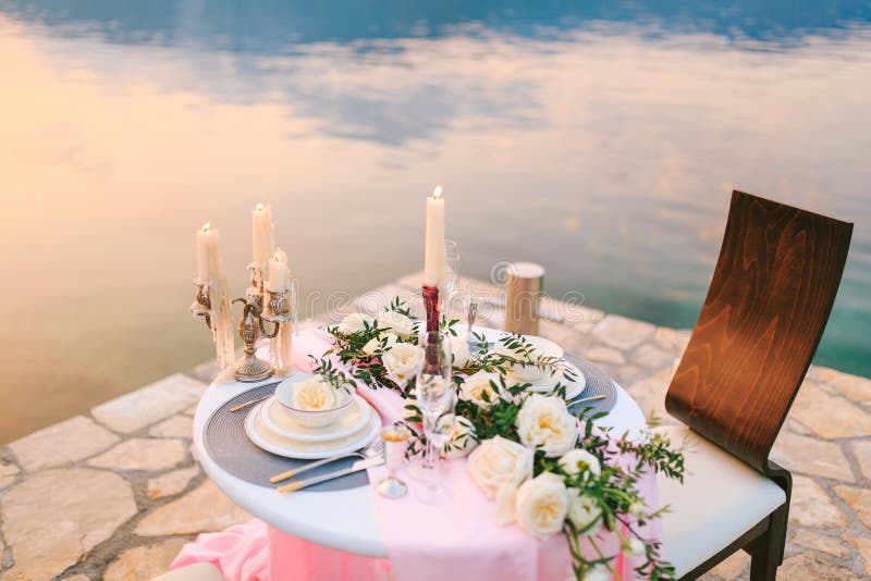 Close-up of a Wedding Dinner Table at Reception. Romantic Sunset Dinner ...