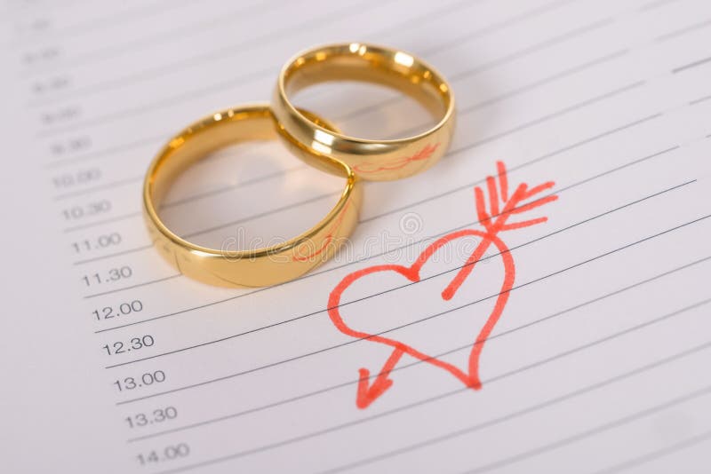 Close-up of Wedding Rings on Paper Stock Image - Image of golden, page ...