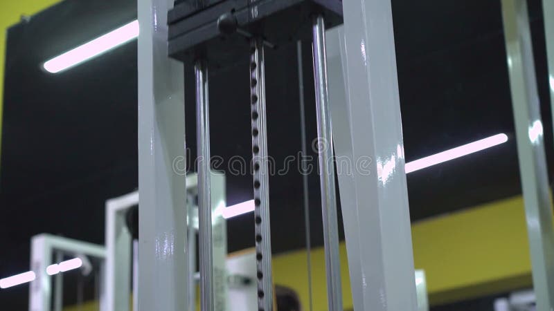 Close-up of a Weight Stack on a Cable Machine in a Gym Stock Video ...