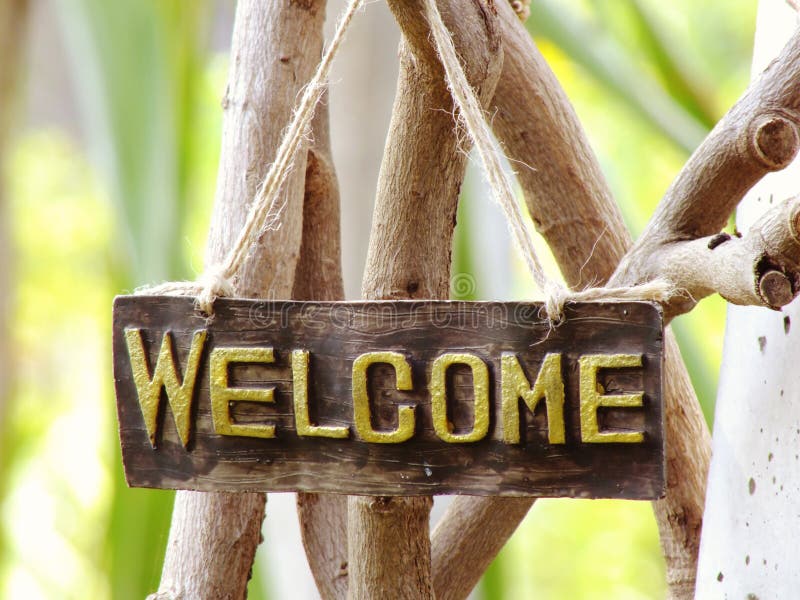 Welcome Sign Hanging in the Garden Stock Image - Image of fence, board ...