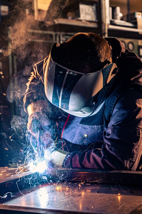 Close Up of a Welder Welding Stock Image - Image of machine, factory ...