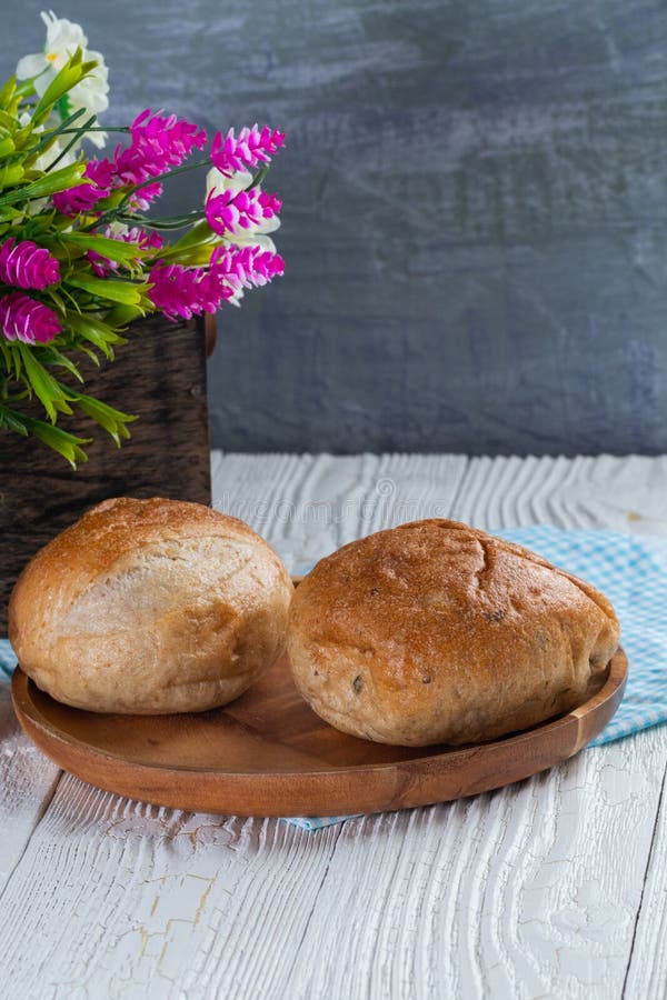 White bread bun on plate stock image. Image of bake - 141232273