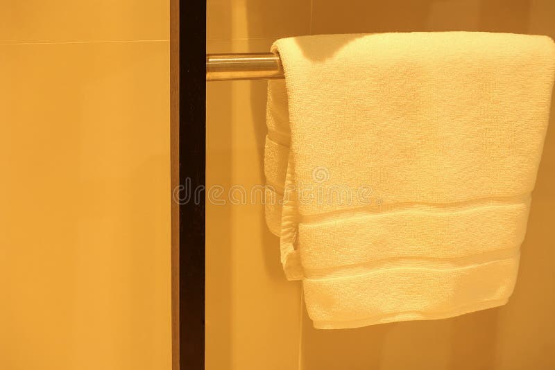 Close Up of White Clean Towel on Holder in Bathroom. Space for Text ...
