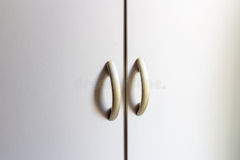 Close Up of a White Cupboard Door with Two White Handles Stock Image ...