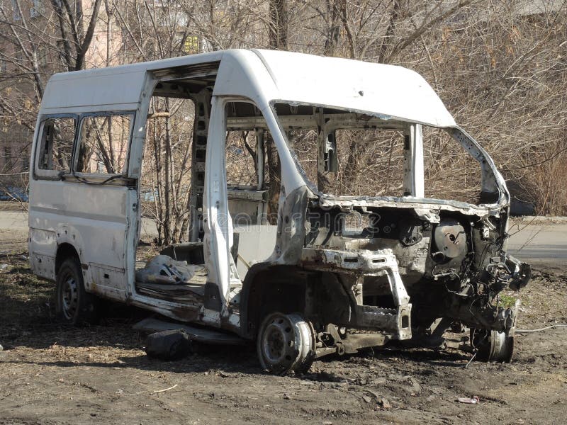 Close-up of a White Old Rusty Van with Broken Windows, No Engine in the ...