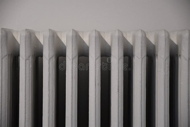 Old White Radiator, from Close Up, with a White Wall Behind. Stock ...
