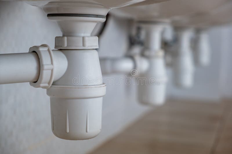 Close Up of White Plastic Pipe Drain Under Washing Sink in Bathroom ...
