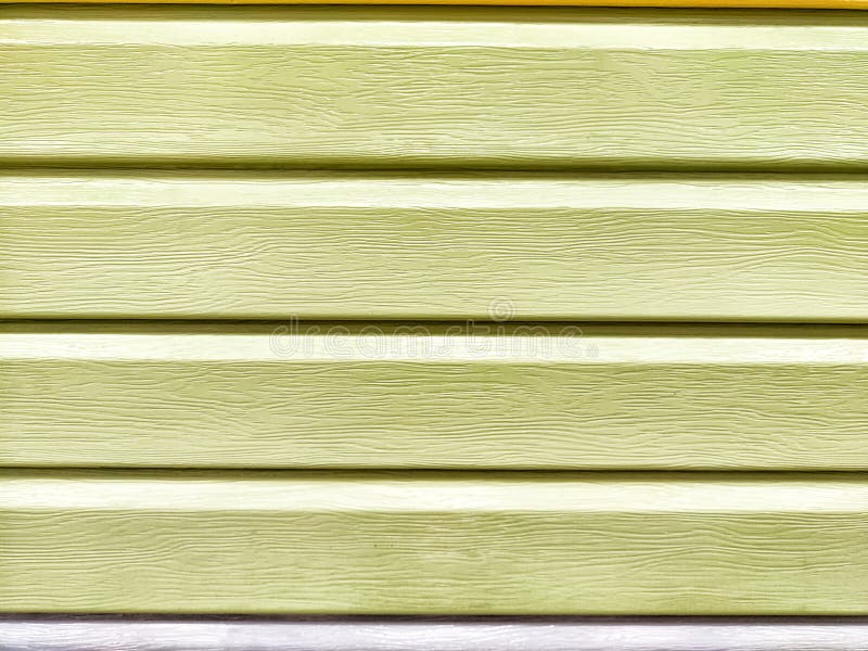 Close Up of White Vinyl Siding with a Wood Grain Texture. Background ...