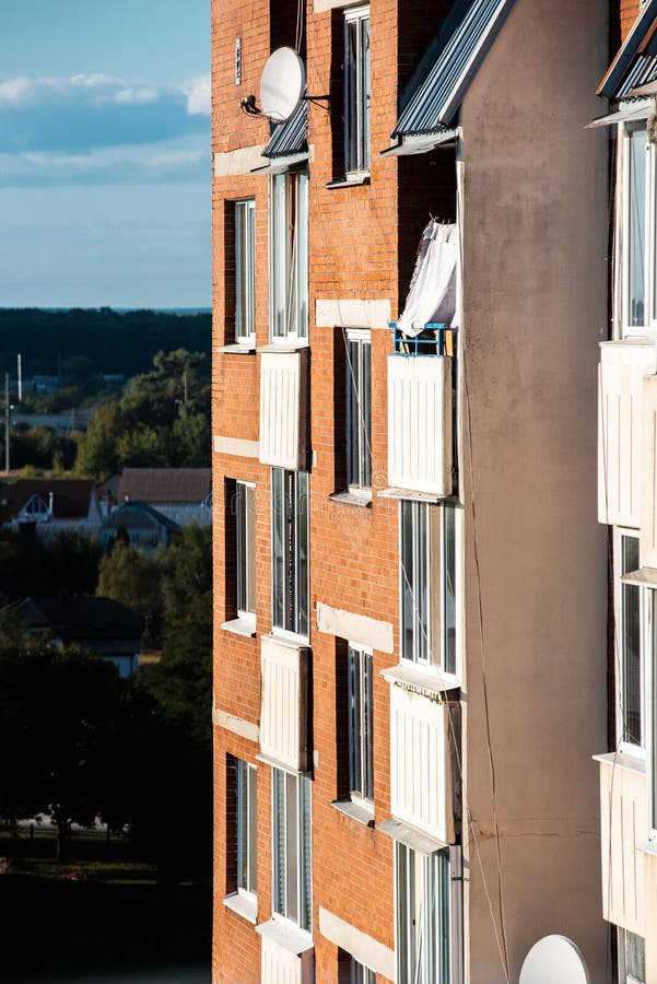 Close-up Window of a High-rise Building with Satellite Dishes Stock ...