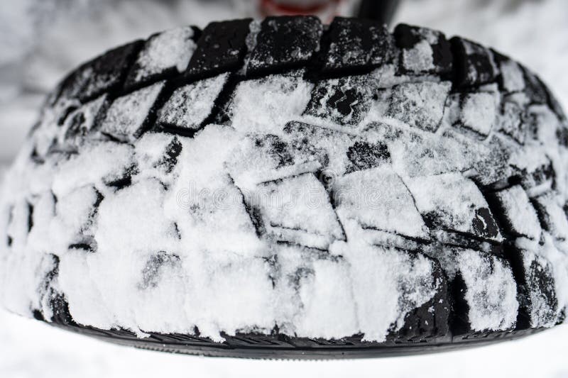Close-up of a Winter Tire Tread on a Snow-covered Road Stock Photo ...