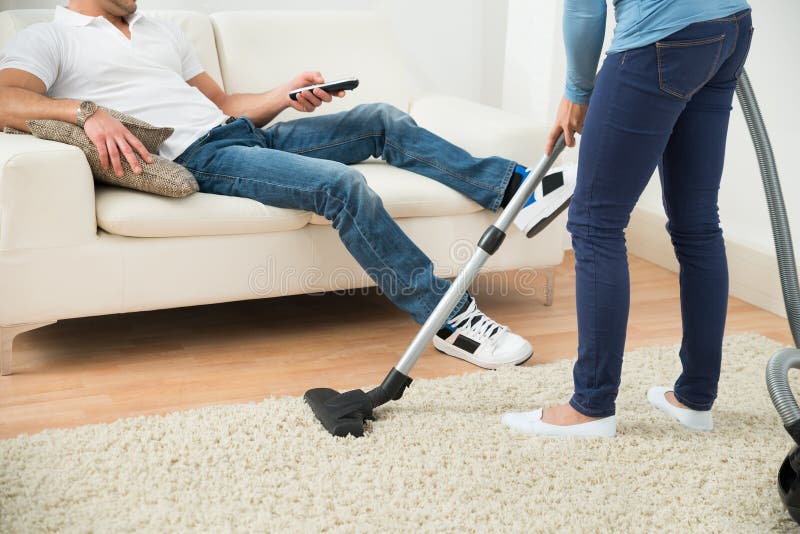 Dusting a Rug - the Traditional Method of Carpet Cleaning Stock Image ...