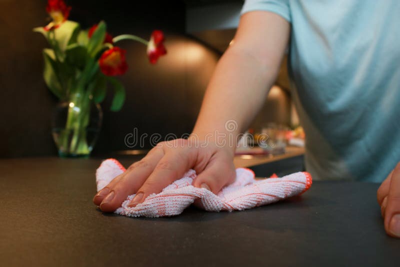 Close Up of Woman Cleaning with Spray and Sponge the Bar Surface in the ...