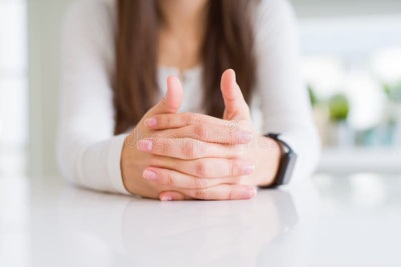 Close Up of Woman Crossed Hands Over White Table Stock Photo - Image of ...