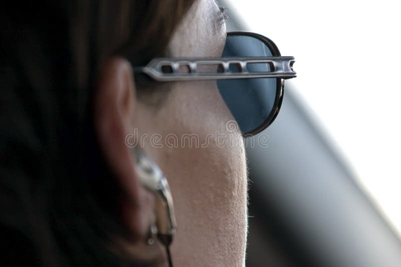 Close Up on a Woman Driving with a Headset on Stock Photo - Image of ...