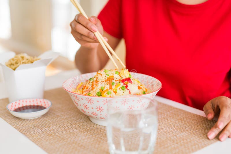 Close Up of Woman Eating Asian Rice Using Chopsticks Stock Image ...
