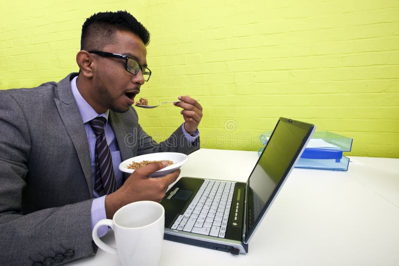 Close Up of Woman Eating at Her Desk Stock Image - Image of internship ...