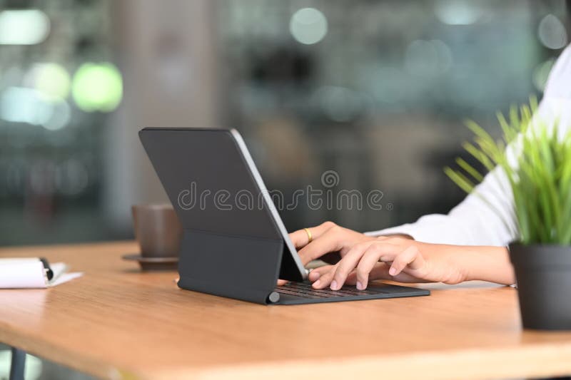 Close Up of Woman Fingers Typing a Business Document on the Computer ...