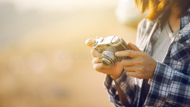 Close Up Woman Hand with a Camera Stock Image - Image of light, camera ...