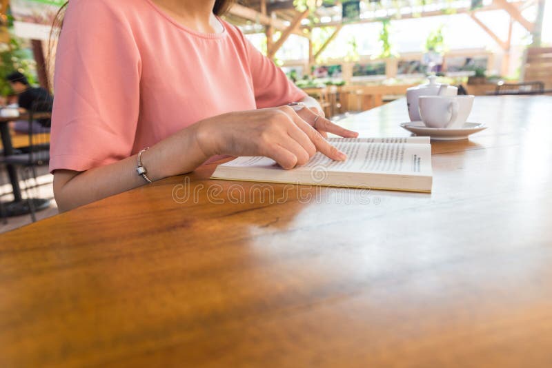 Close Up of Woman Hand Reading Book Stock Image - Image of life, aroma ...