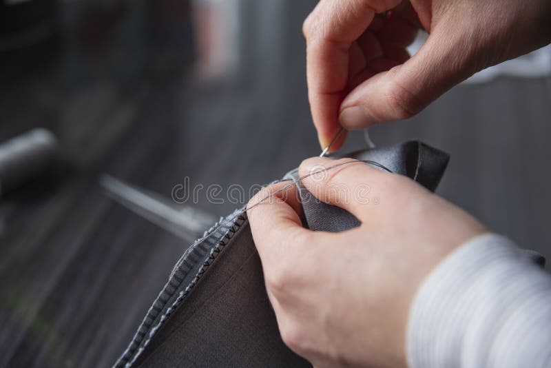 Close Up of Woman Hand Sewing Stock Photo - Image of clothes, garment ...
