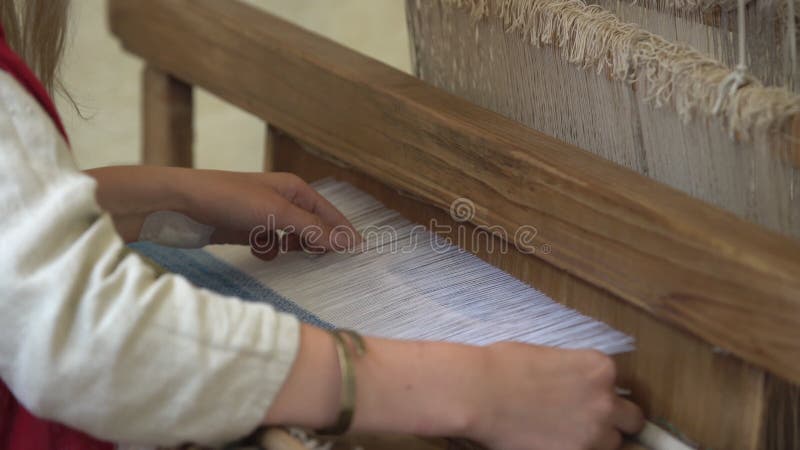 Close Up of Woman Hands Weaving Blue and White Pattern on Loom ...