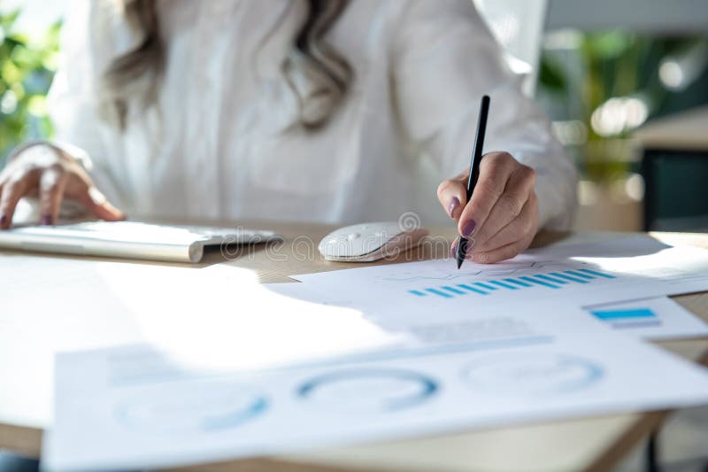 Close Up of a Woman Making Notes and Working with Schemes Stock Photo ...