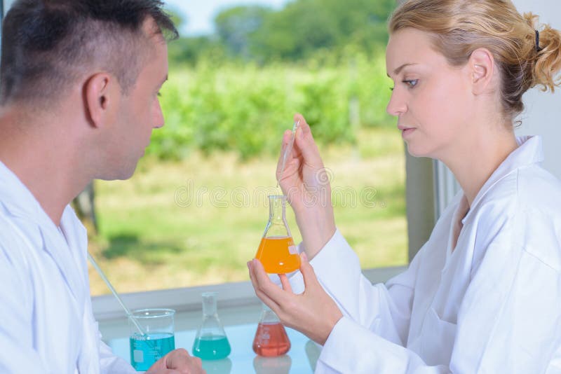Close Up Woman and Man Testing Stock Photo - Image of experiment ...