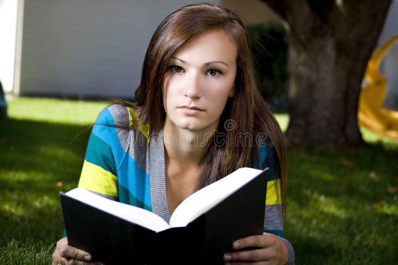 Close Up on a Woman Reading a Book Stock Photo - Image of joyful ...