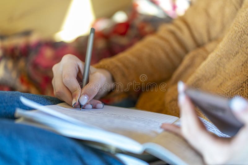 Close Up of a Woman S Hand Holding a Mobile Smartphone and Using a Pen ...