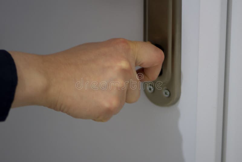 Close Up of Woman& X27;s Hand Locking or Unlocking the Door Stock Image ...