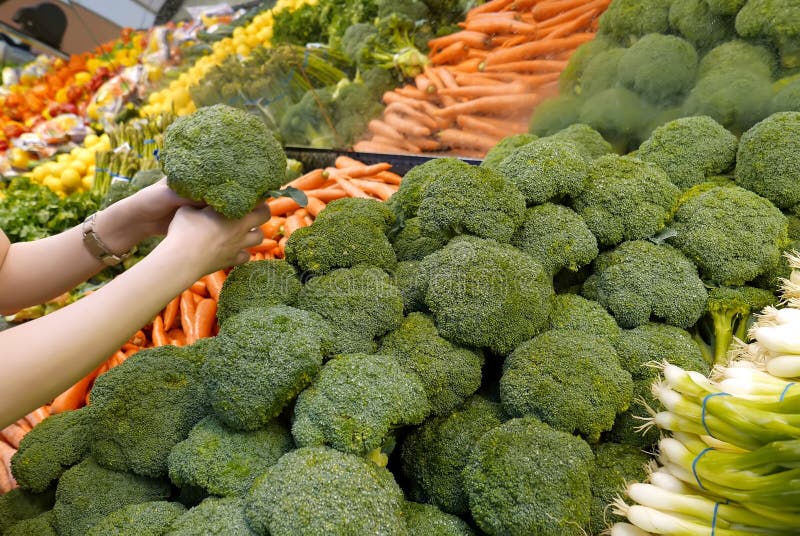 Woman Selecting Broccoli in Grocery Store Stock Image - Image of fresh ...