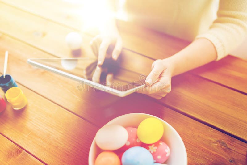 Close Up of Woman with Tablet Pc and Easter Eggs Stock Photo - Image of ...