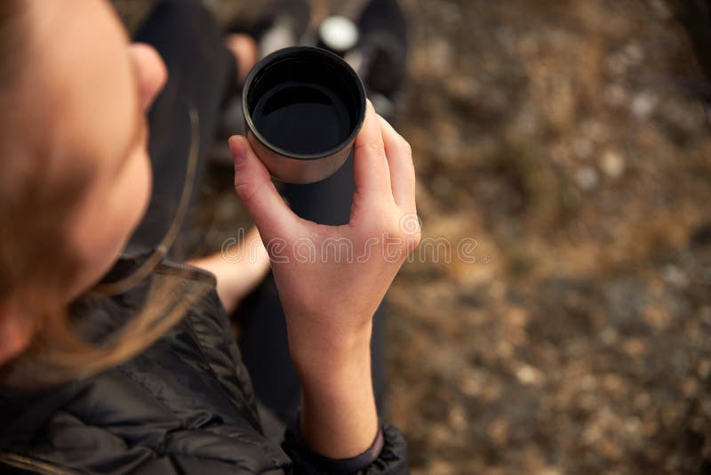 Close Up of Woman Taking a Break from Countryside Hike and Drinking ...