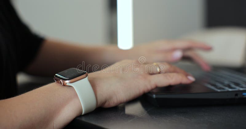Close-up of Woman Touching Smart Watch Screen Swiping Device Display in ...