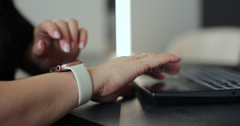 Close-up of Woman Touching Smart Watch Screen Swiping Device Display in ...