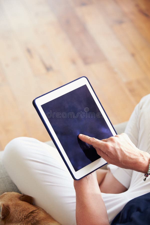 Close Up of Woman Using Digital Tablet at Home Stock Image - Image of ...