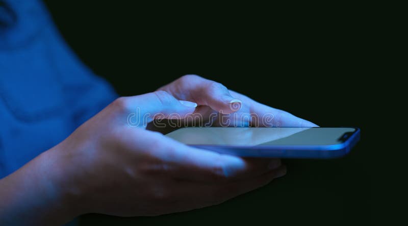 Close Up of Woman Using Mobile Phone at Home at Night with Blue ...