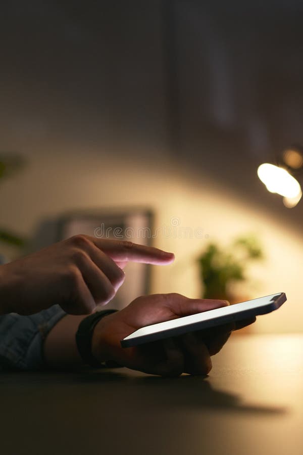Close Up of Woman Using Mobile Phone at Home at Night with Illuminated ...