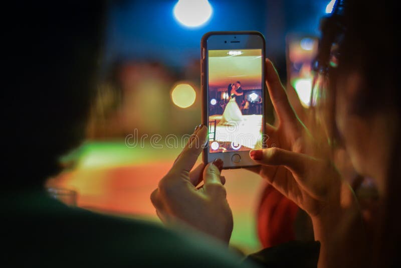 Close-up Of Woman Using Mobile Phone At Night Picture. Image: 86251666