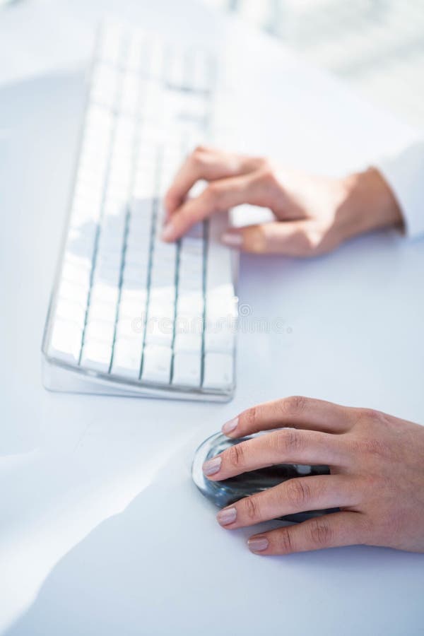 Close Up of a Woman Using a Mouse Stock Photo - Image of electronic ...