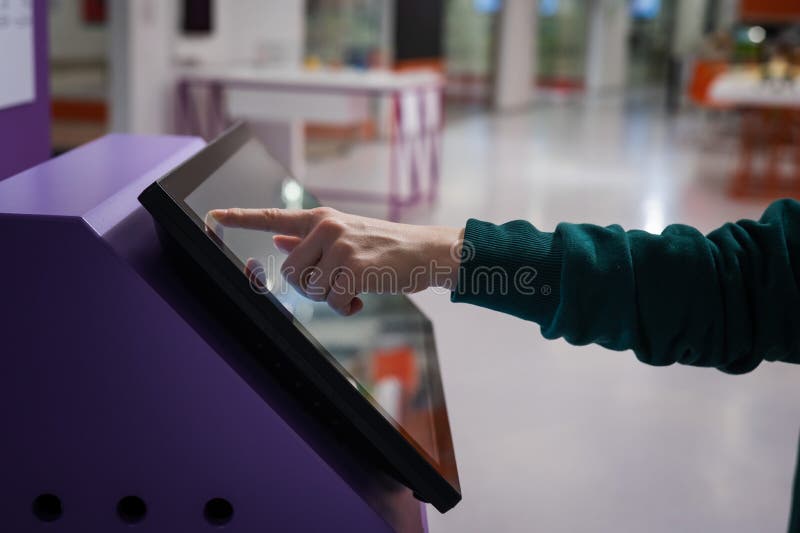 Close-up of a Woman Using a Touch Screen Information Booth. Stock Image ...