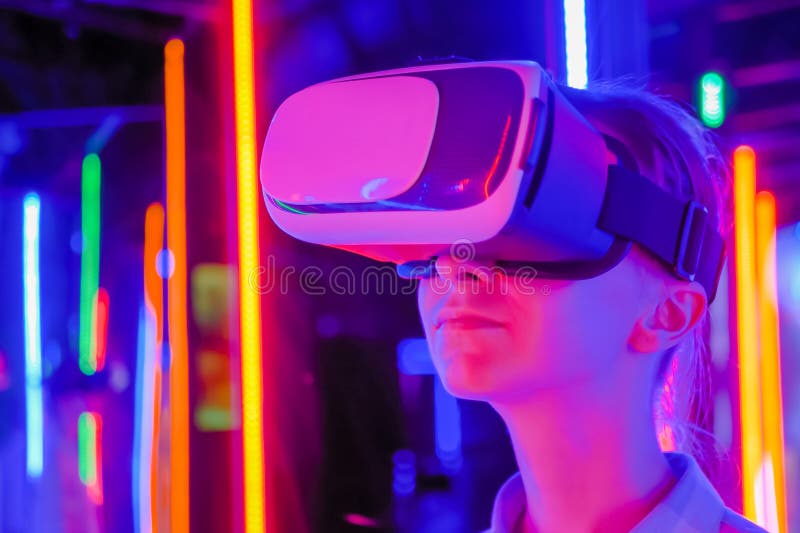 Woman Using Virtual Reality Headset at Interactive VR Exhibition: Close ...