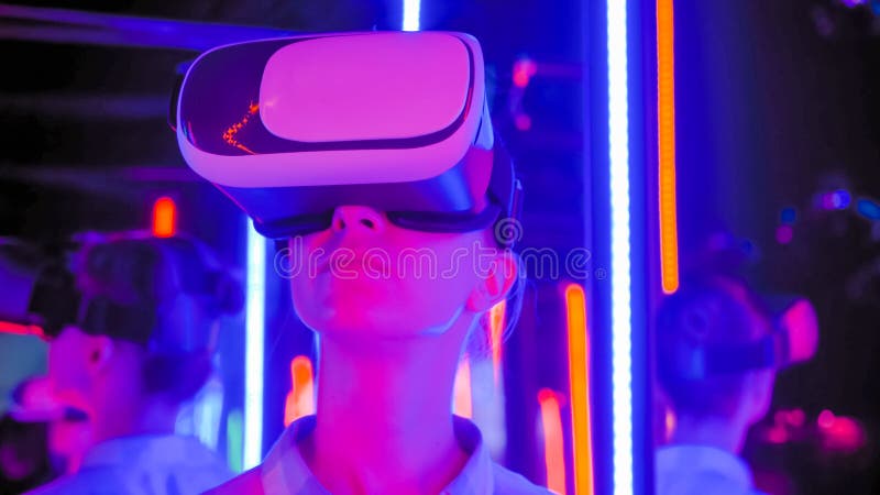 Woman Using Virtual Reality Headset at Interactive VR Exhibition: Close ...