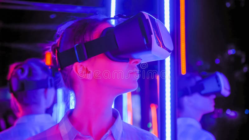 Woman Using Virtual Reality Headset at Interactive VR Exhibition: Close ...