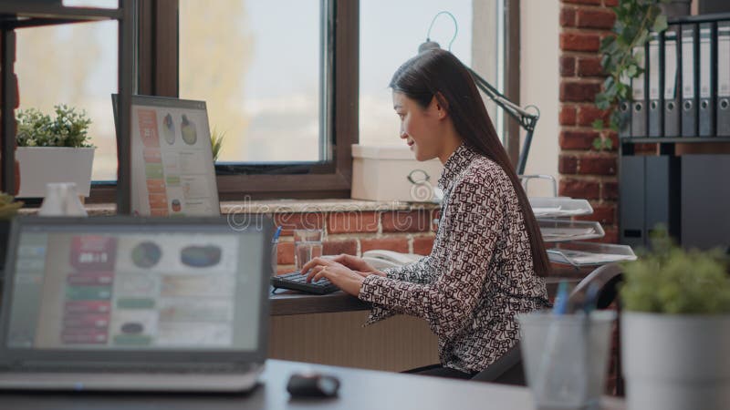 Close Up of Woman Working on Project Planning with Computer Stock Photo ...