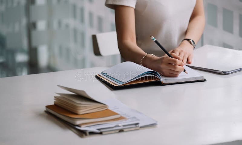 Close Up of a Woman Writer Hand Writing in a Notebook at Home Stock ...