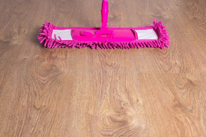 Close Up of Wooden Floor with Pink Mop Stock Image - Image of domestic ...