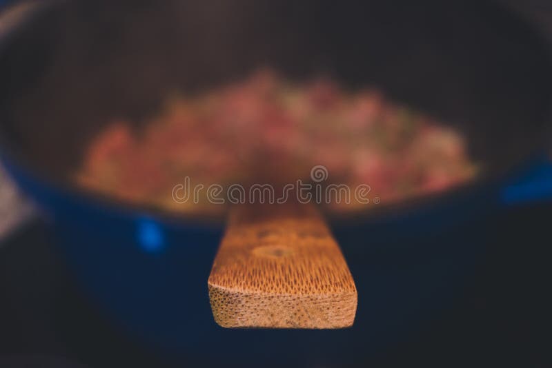 Close-up of a Wooden Spoon Inside a Pot Stock Photo - Image of food ...