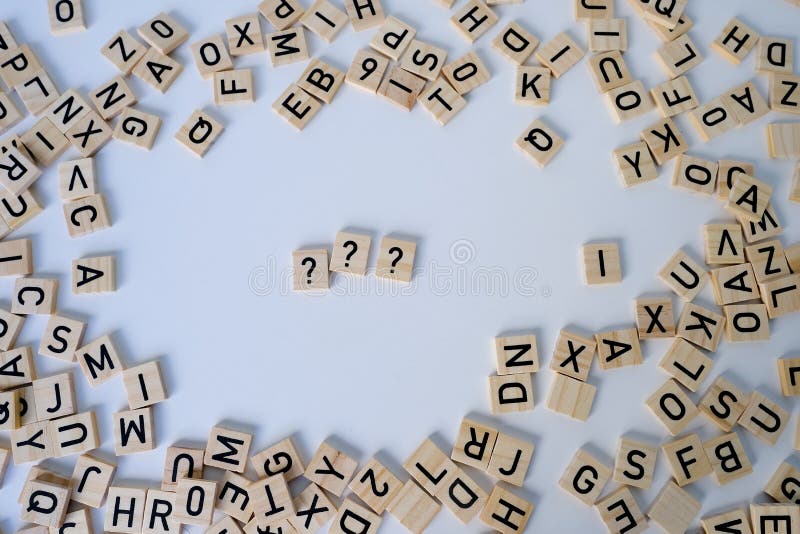 Close-up of Wooden Squares with Question Mark, Scattering of Wooden ...